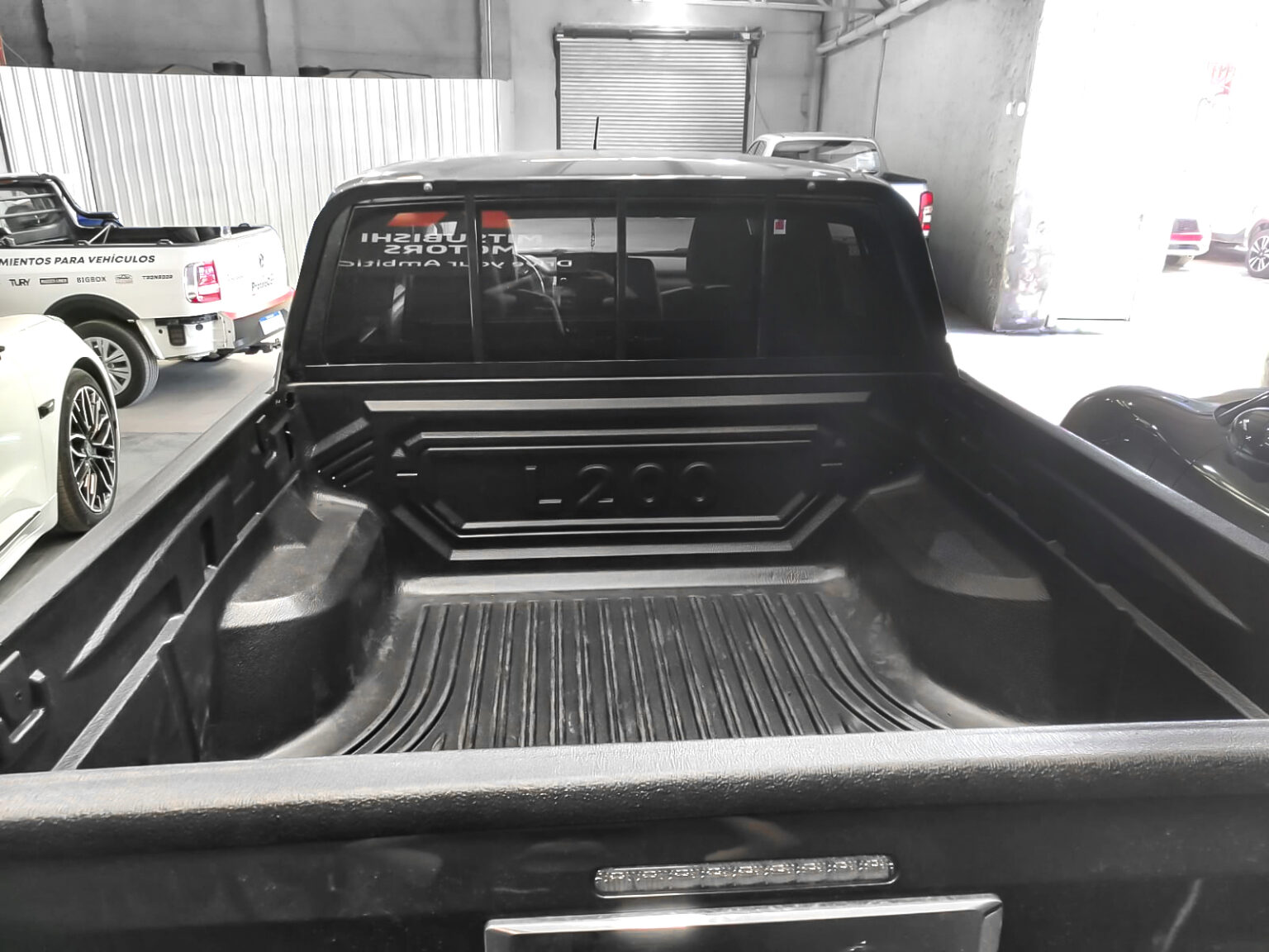 Cubre Caja Con Bordes Polietileno Mitsubishi L200 2024+ DC - ProtecCar